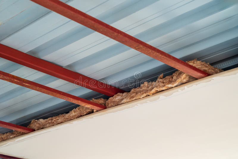 Insulation Application Made with Glass Wool between the Attic of the ...