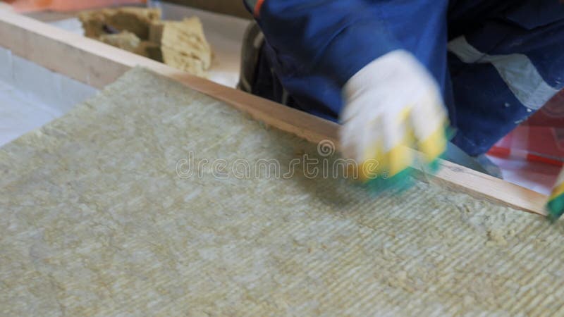 Insulation of a Frame House with Mineral Wool. Cutting, Fitting, Laying ...