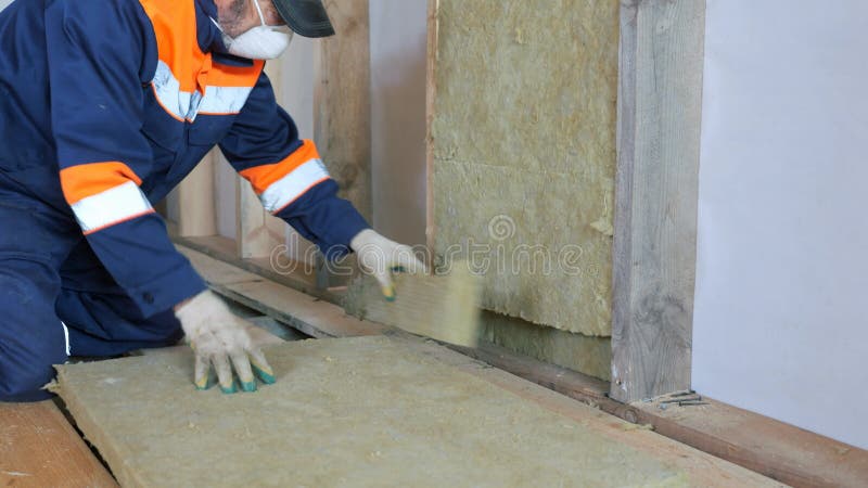 Insulation of a Frame House with Mineral Wool. Cutting, Fitting, Laying ...
