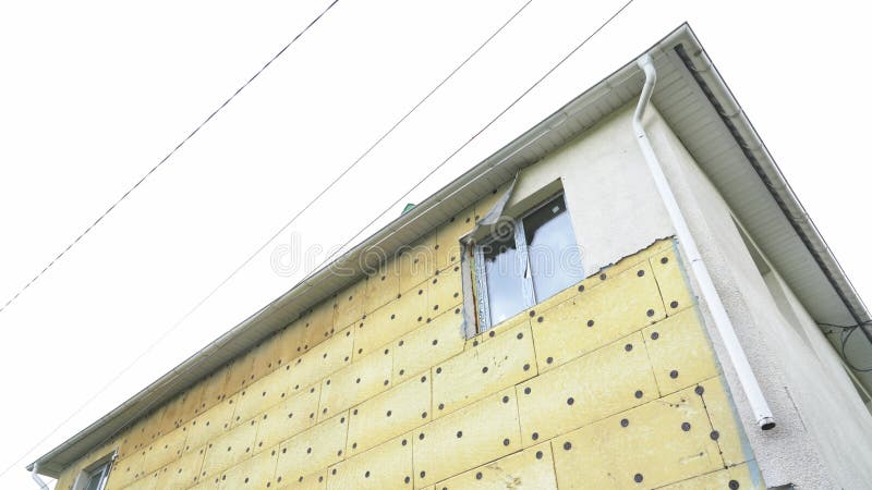 Insulation of a Residential Building. Exterior Repair Work on the ...