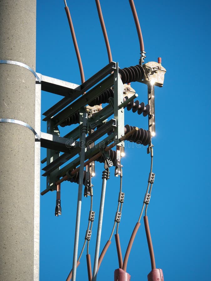 Insulators on Power Lines on a Pole of an Overhead Power Line Stock ...