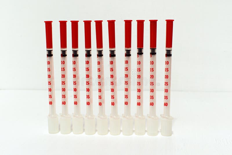 10 Insulin Syringes with Red Caps Stock Photo - Image of medical ...