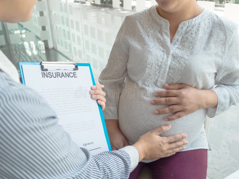 Insurance Agent Holding Chart and Explain Insurance Policy To Pregnant ...