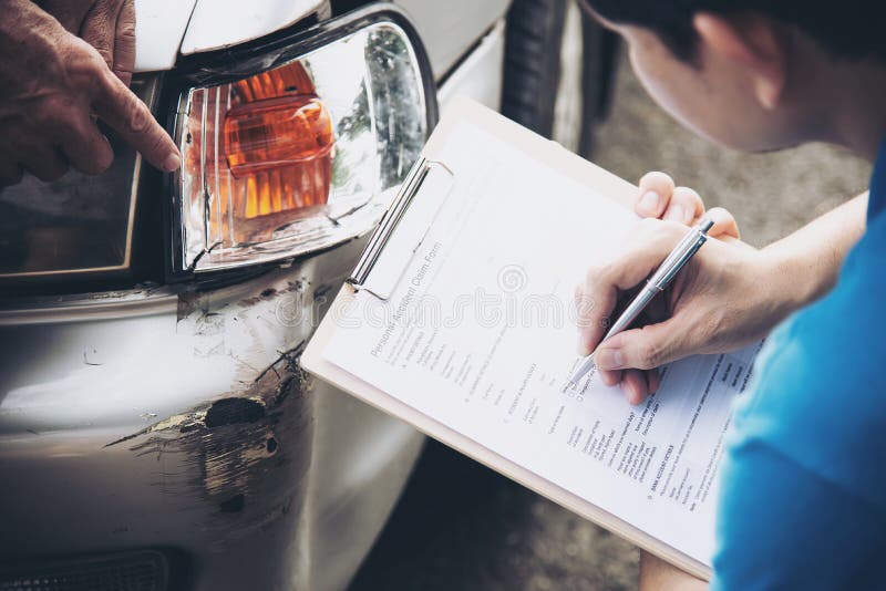 Insurance Agent Working during on Site Car Accident Claim Process Stock ...