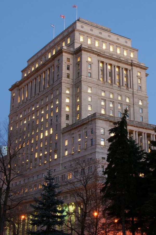 Insurance Building of Montreal at Dusk Stock Photo - Image of flags ...