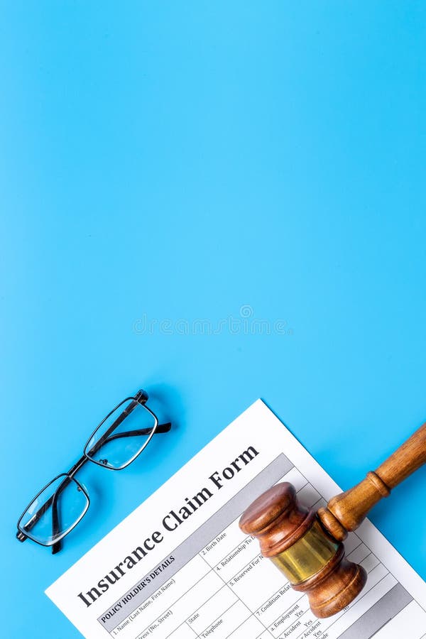 Insurance Claim Form with Judge Gavel . Top View Stock Photo - Image of ...