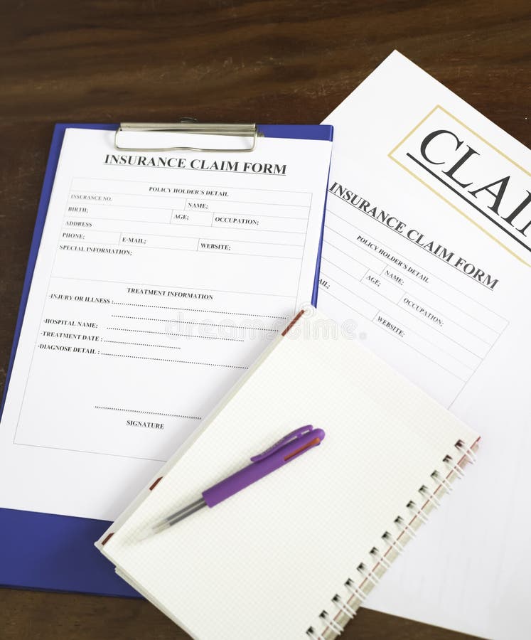 Insurance Claim Form Put on Wood Board Stock Photo - Image of filling ...