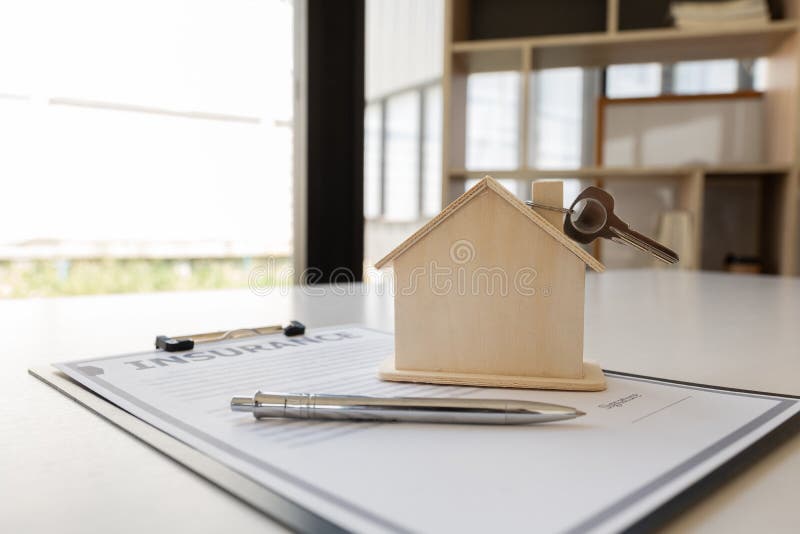 Insurance Form with Sample of House and Keys Home Insurance Concept ...
