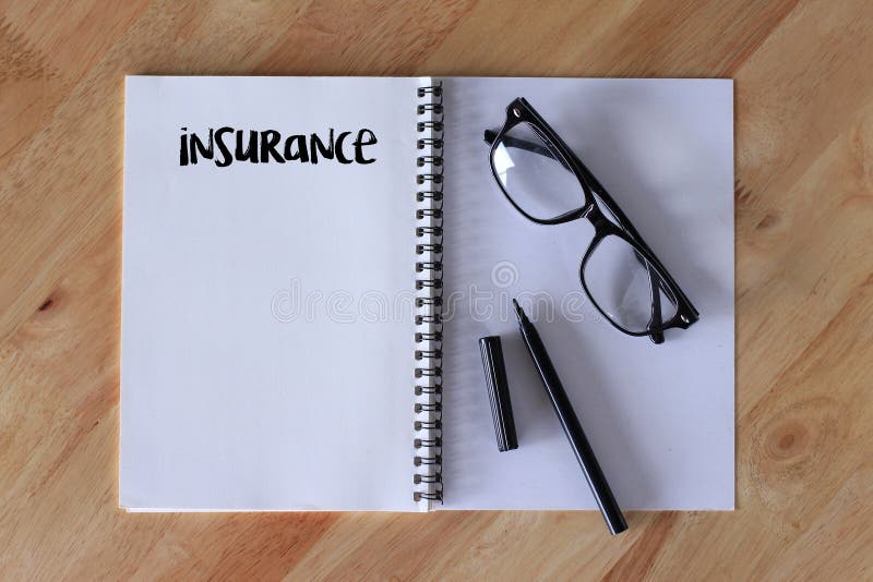 Insurance Word Writing on Notebook on Wooden Table Stock Image - Image ...