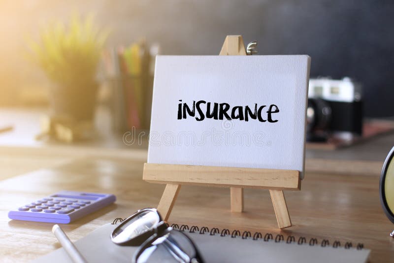 Insurance Word Writing on Notebook on Wooden Table Stock Image - Image ...