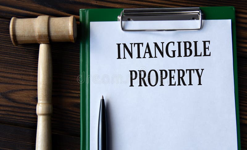 INTANGIBLE PROPERTY - Words on a White Sheet with a Judge S Gavel Stock ...