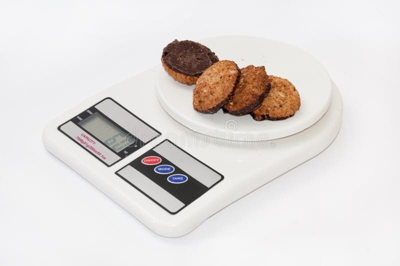 Integral Chocolate Cookies on the Digital Kitchen Scale Stock Photo ...