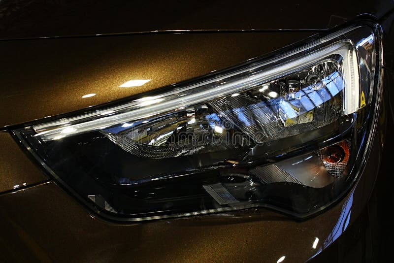 Headlight of a German Sports Car Stock Image - Image of headlamp, matt ...