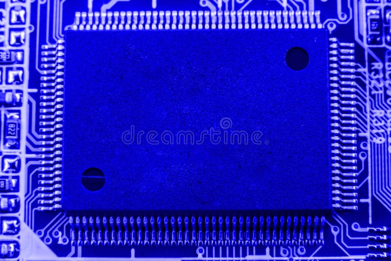 Integrated Semiconductor Microchip on Blue Circuit Board Representative ...