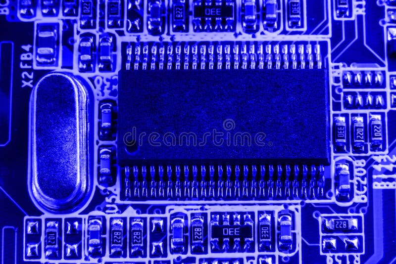 Microchip on Blue Circuit Board Stock Photo - Image of hardware, board ...