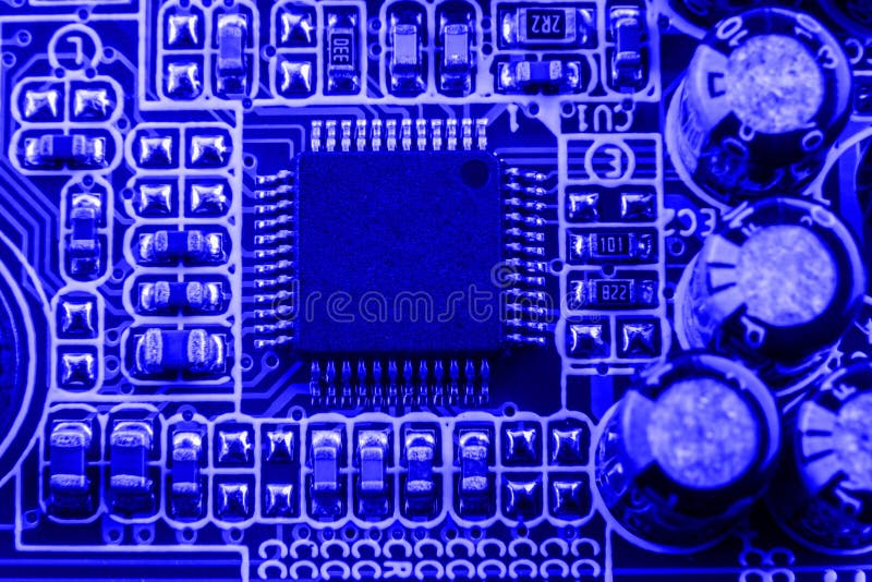 Microchip on Blue Circuit Board Stock Photo - Image of hardware, board ...