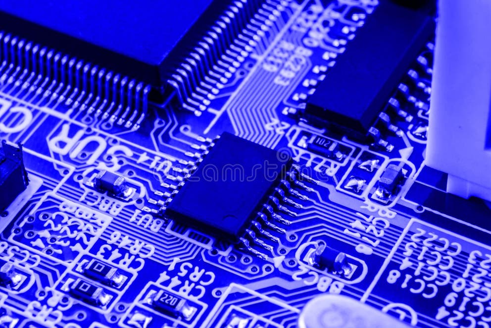 Integrated Semiconductor Microchip on Blue Circuit Board Representative ...