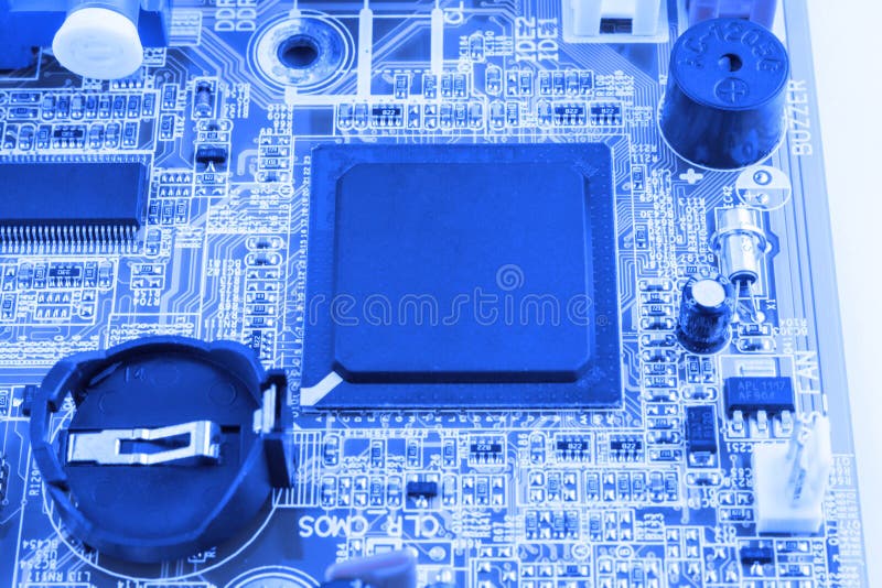 Integrated Semiconductor Microchip on Blue Circuit Board Representative ...