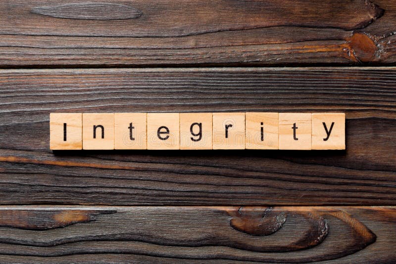 Integrity Word Written on Wood Block. Integrity Text on Table, Concept ...