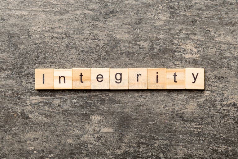 Integrity Word Written on Wood Block. Integrity Text on Table, Concept ...