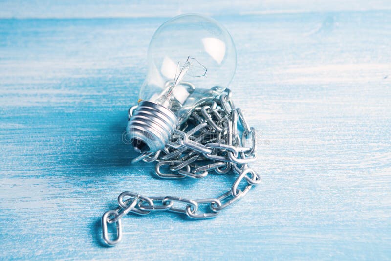 Intellectual Property. Light Bulb with Chain Stock Photo - Image of ...