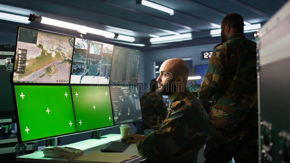 Intelligence Corps Expert Controlling Drones with Mockup Notebook Stock ...
