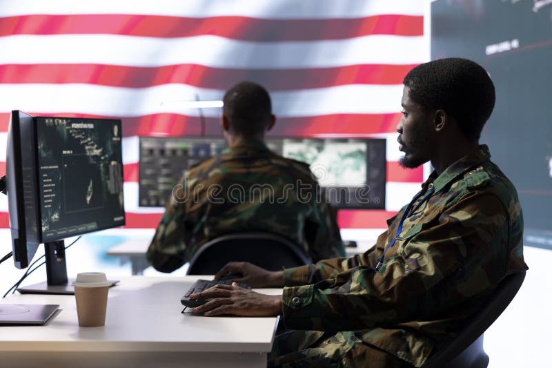 Intelligence Officers in American Military Uniforms Work on Computers ...