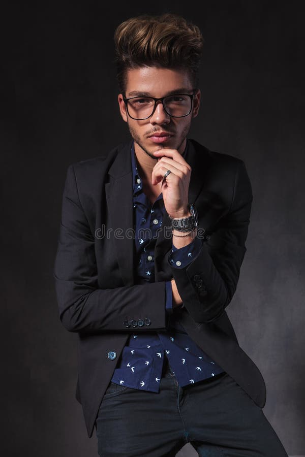 Seated man is thinking stock photo. Image of model, hands - 157419720