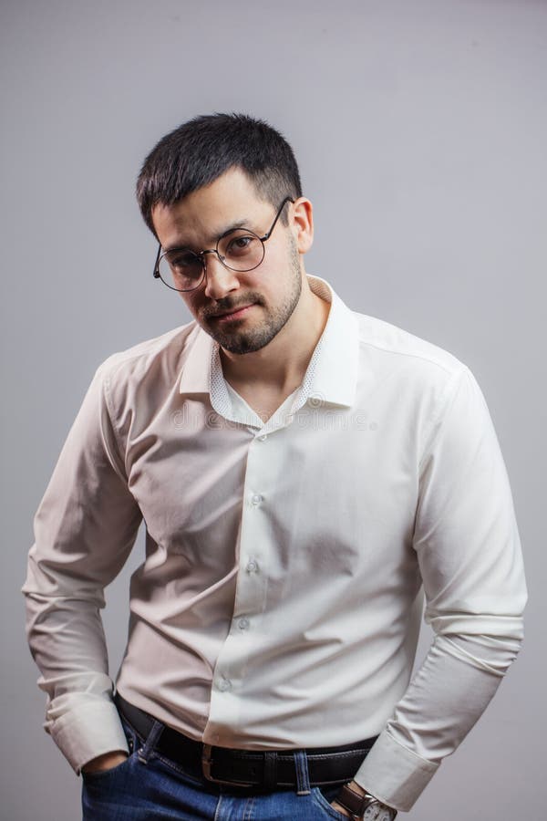 An Intelligent Young Male Posing To the Camera. Successful Business ...