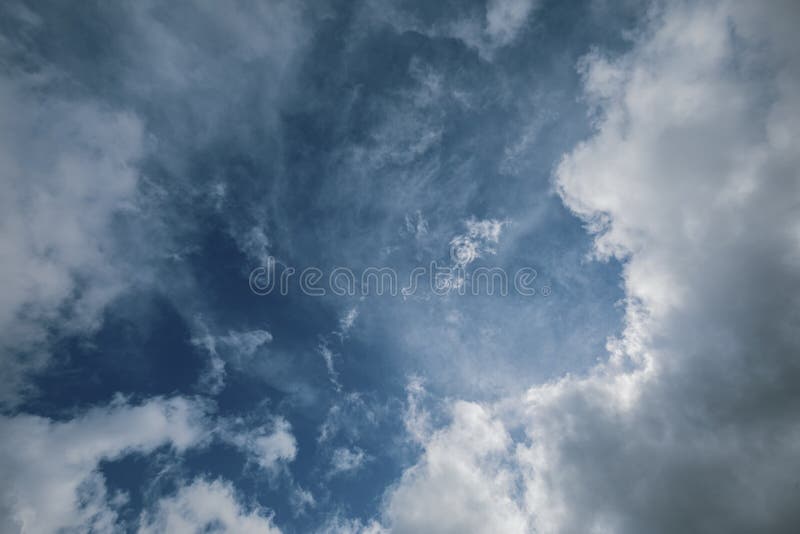 Intense Blue Sky with Fluffy White and Greyish Storm Clouds and Intense ...