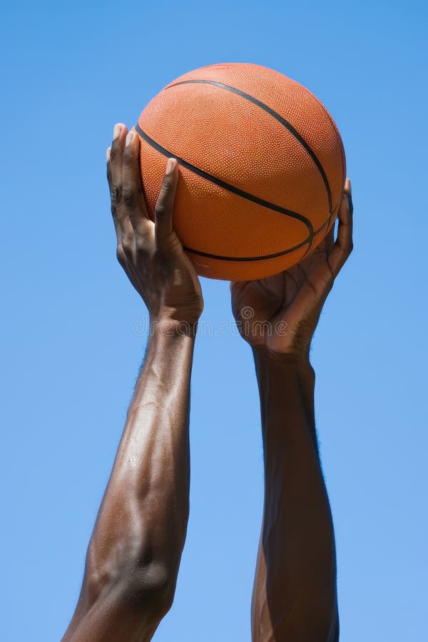 Intense Focus Basketball Player Reaching for Rebound with Determination ...