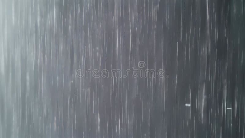 Macro Closeup of a Heavy Downpour at Night, with Illuminated Raindrops ...