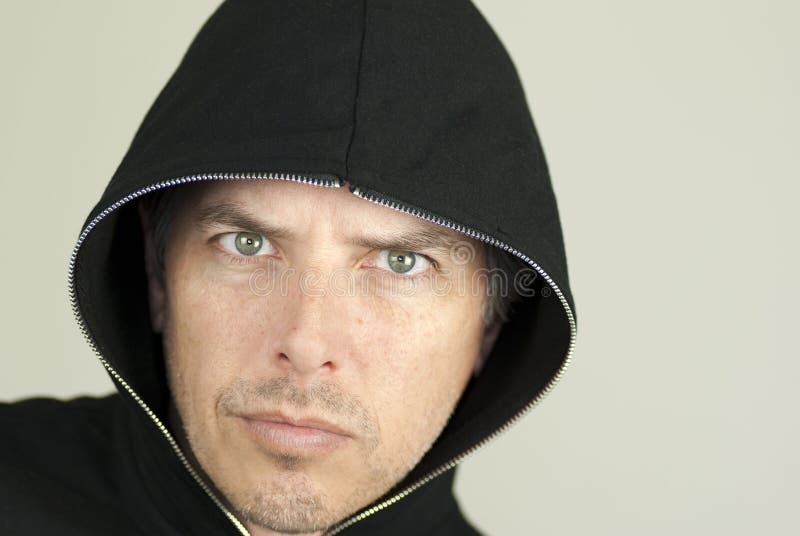 Intense Man Looks To Camera Stock Image - Image of hoodie, male: 19567017