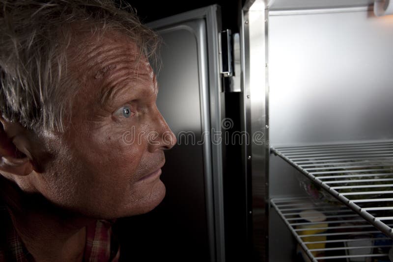 Intense Man Staring into Refrigerator Stock Image - Image of intense ...