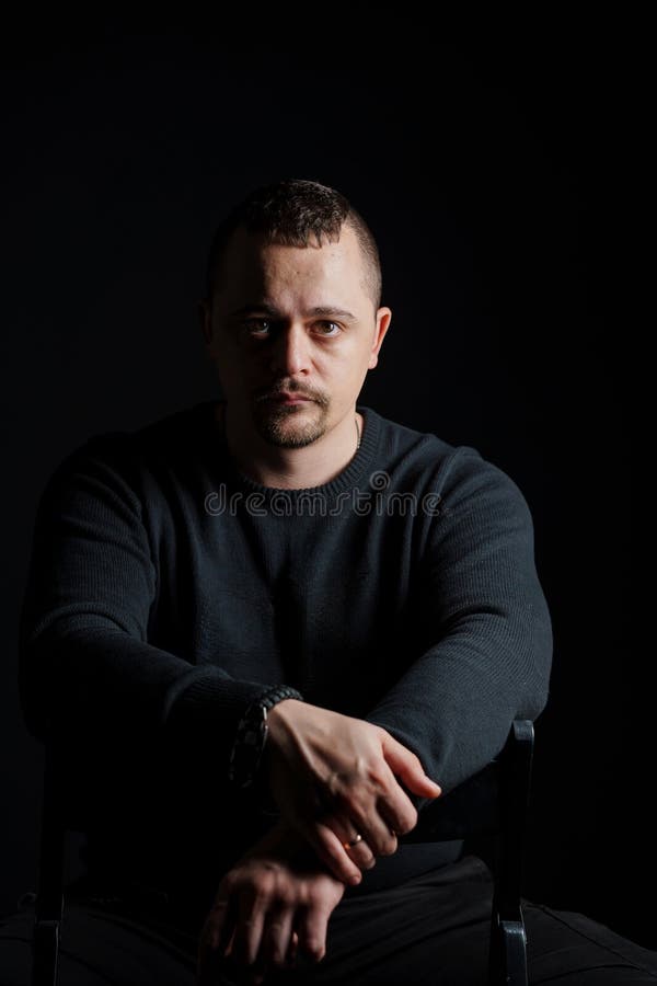 Intense Portrait of a Thoughtful Man in Low Light Stock Image - Image ...
