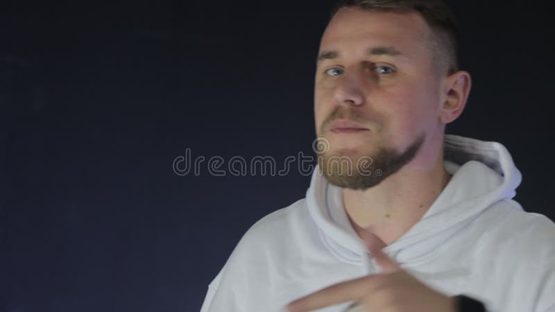 Intense Rapper with Hand Gesture, a Close-up of an Expressive Rapper ...