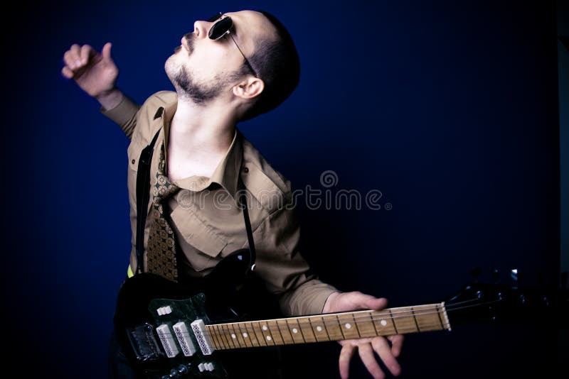 Intense rock guitarist stock image. Image of intense, fretboard - 2888113