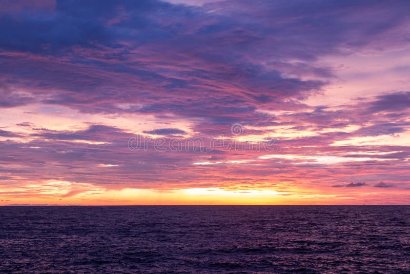 Intense Seaside Sunset stock photo. Image of sunset - 262520140