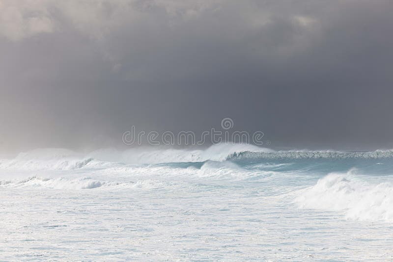 Intense Waves in the Ocean with Dark Clouds in the Background Stock ...
