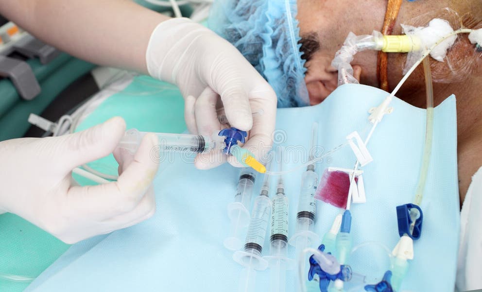Intensive Cure of Patient in ICU Stock Photo - Image of infusion ...