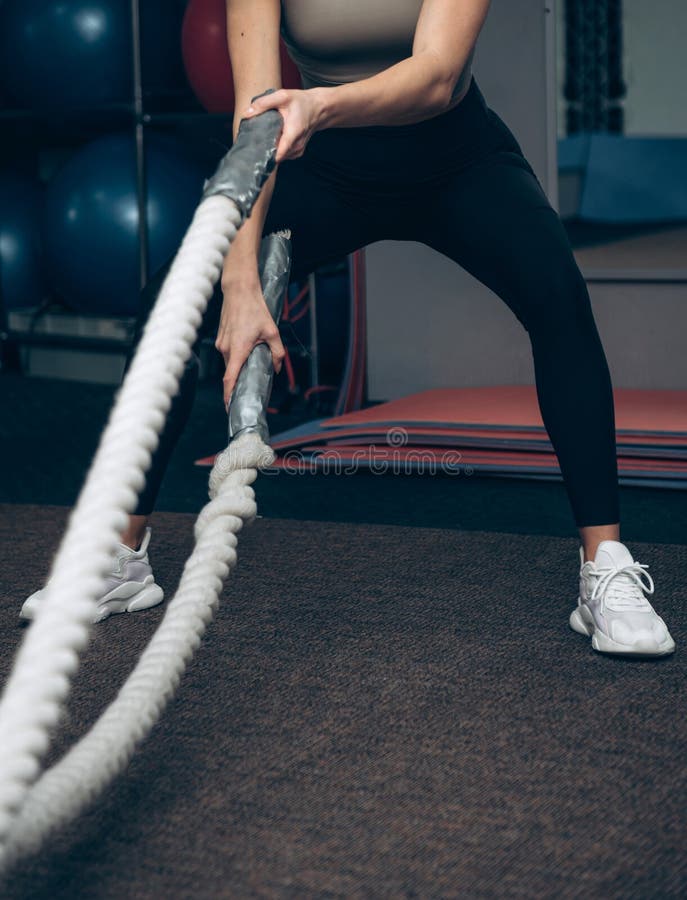 Intensive Workout Fit Woman with Battle Ropes. Functional Training ...