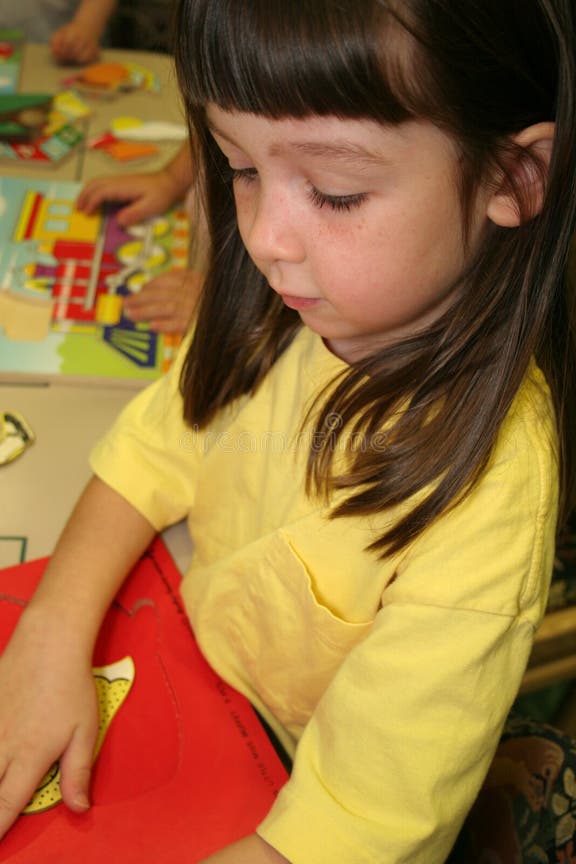 Intent puzzle girl stock photo. Image of children, cute - 162530
