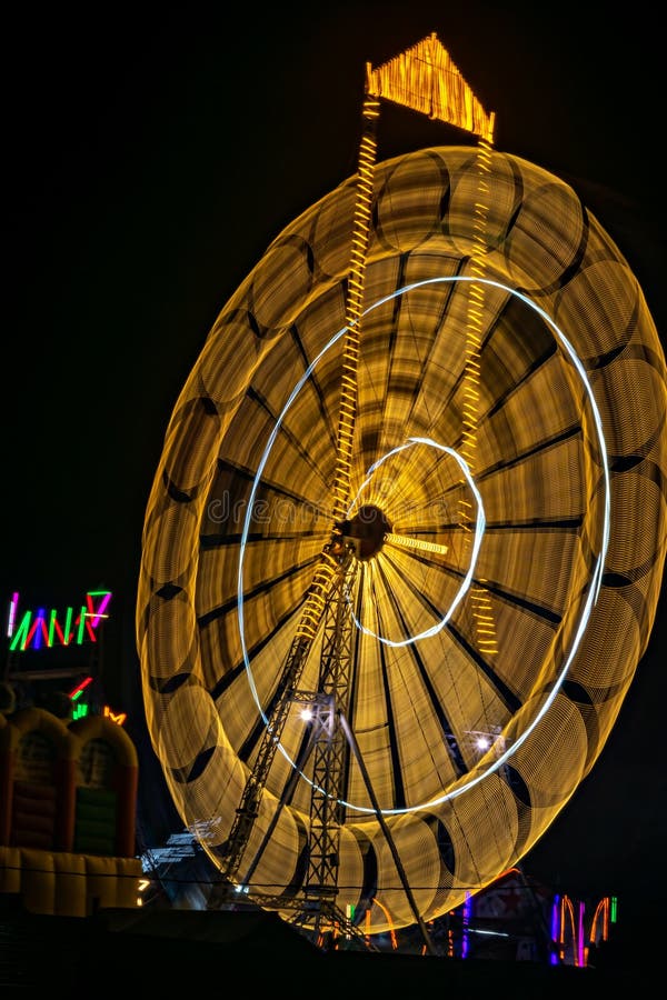 Giant Ferris Wheel in an Amusement Park Stock Photo - Image of clouds ...