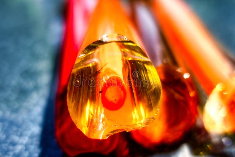 Intentionally Blurred Close-up View of a Colored Glass Rod with Core ...