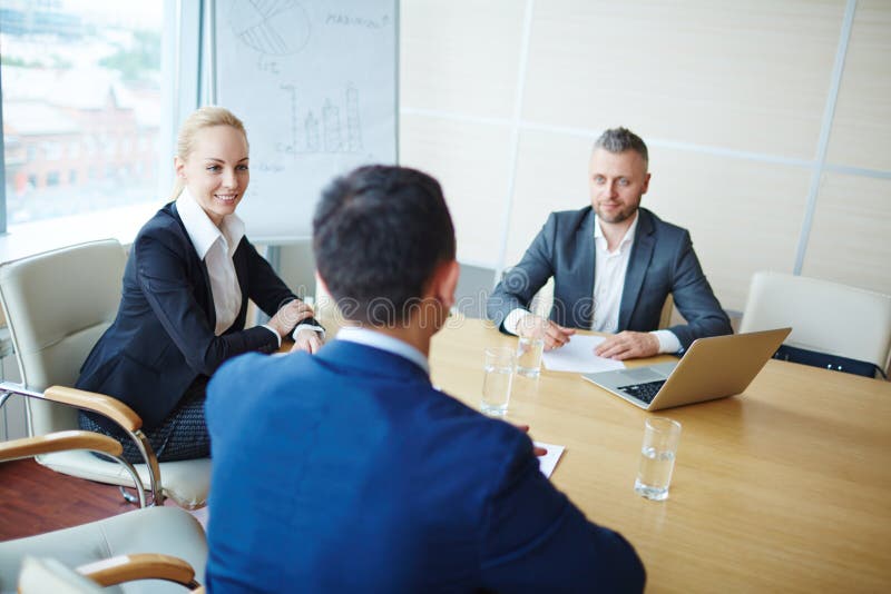 Interaction in office stock image. Image of business - 73591147