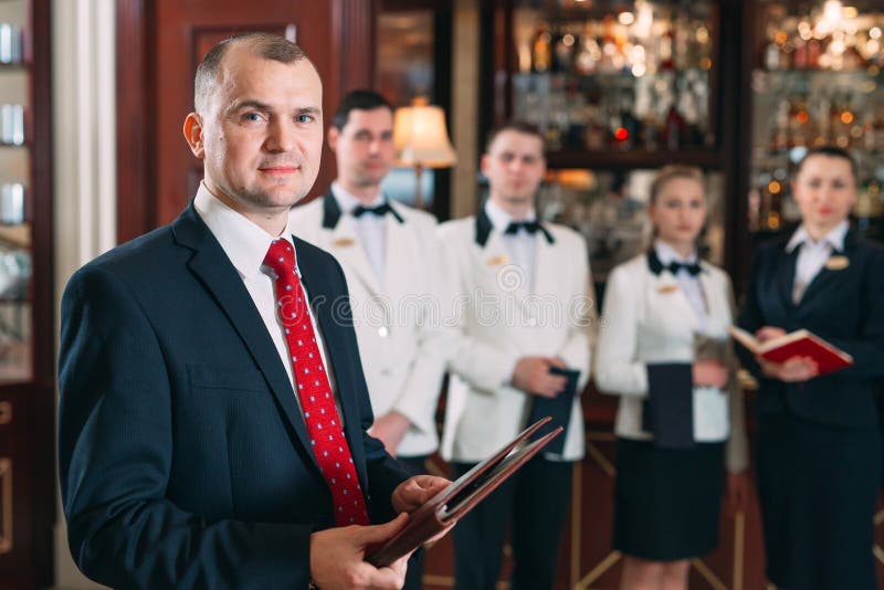 The Interaction of the Staff. Hotel or Restaurant Manager and His Staff ...