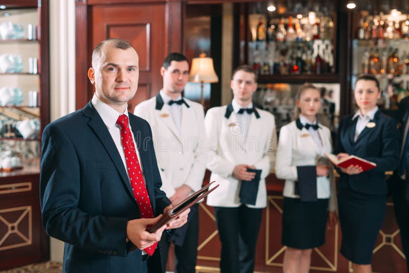 The Interaction of the Staff. Hotel or Restaurant Manager and His Staff ...