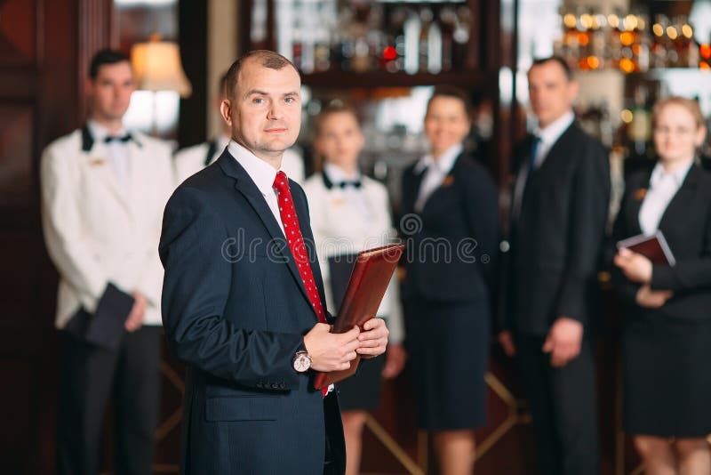 The Interaction of the Staff. Hotel or Restaurant Manager and His Staff ...