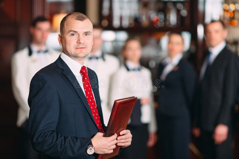 The Interaction of the Staff. Hotel or Restaurant Manager and His Staff ...