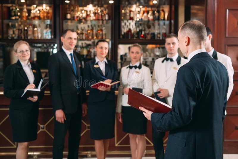 The Interaction of the Staff. Hotel or Restaurant Manager and His Staff ...